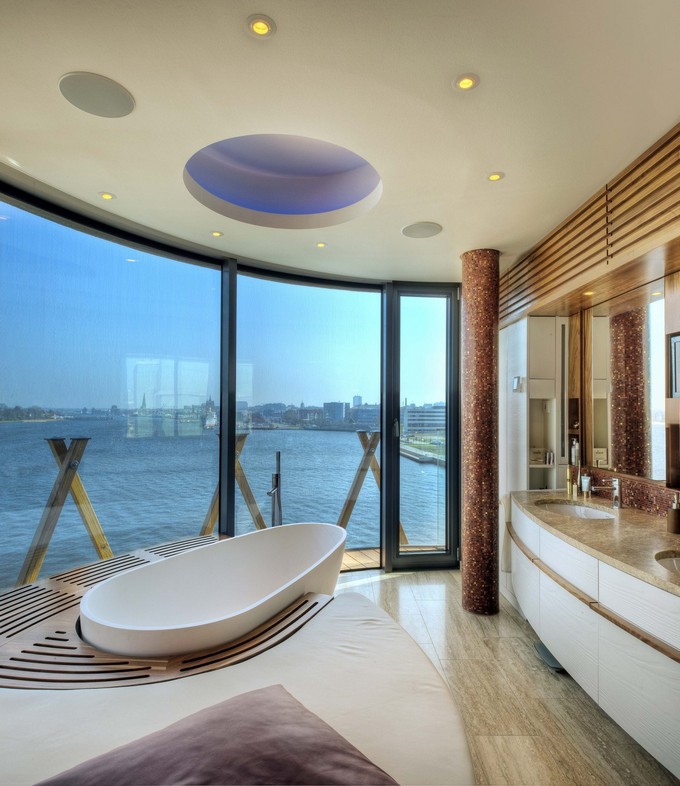 Make a Splash Into Your Bathroom With Floor-to-Ceiling Windows | Maison ...
